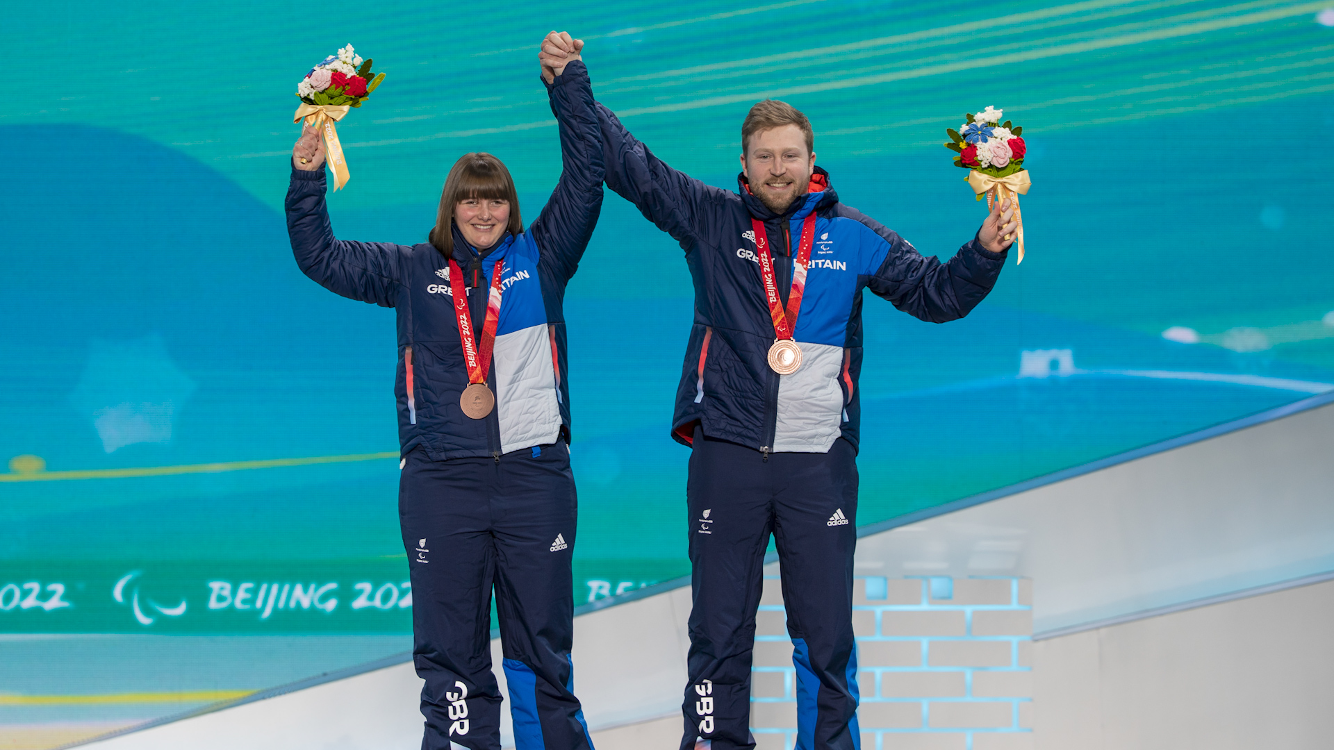 Winter Paralympics: Royal Navy guide Brett Wild wins GB's first medal