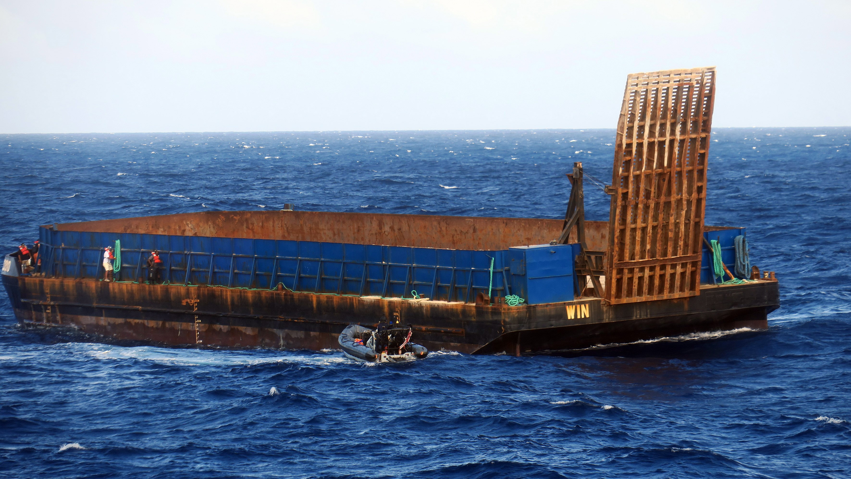 Royal Navy patrol ship rescues crew from sinking tug in Caribbean