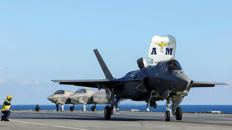 HMS Queen Elizabeth: Italian jets operate from carrier's flight deck