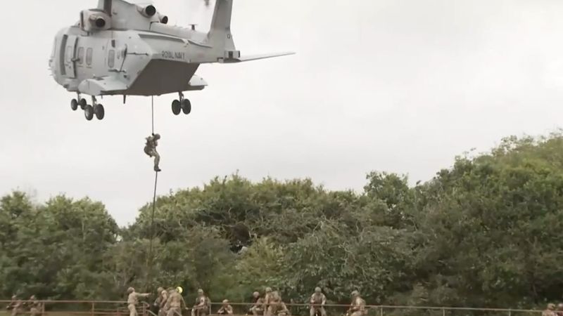 Royal Marines fast-rope from Merlins and assault fort as they hone ...