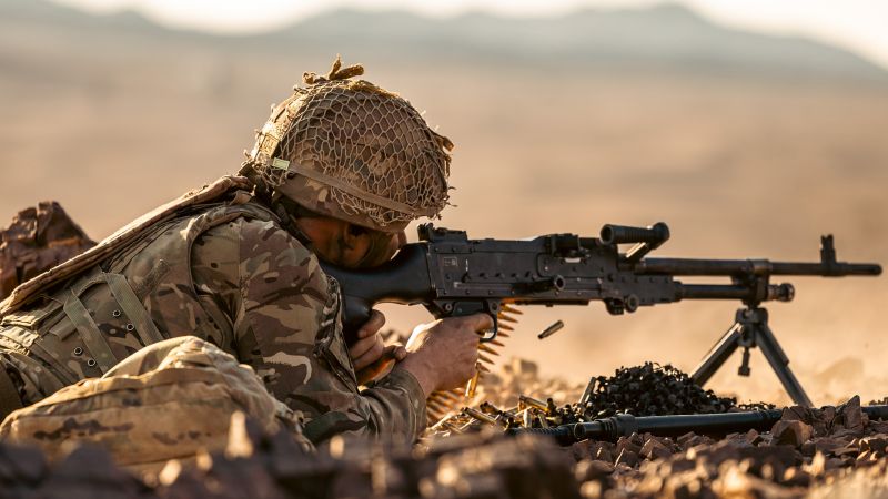 Tigers fire and manoeuvre on exercise in the unforgiving heat of the ...