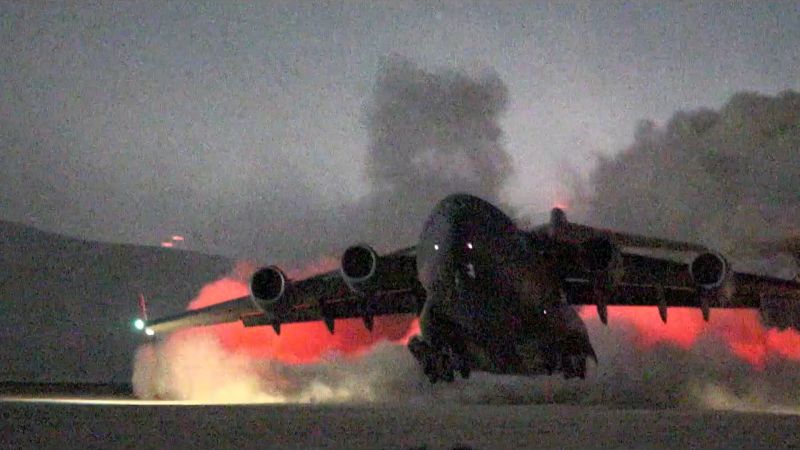 Globemasters make dark descent as they land on dried-up desert lakebed ...