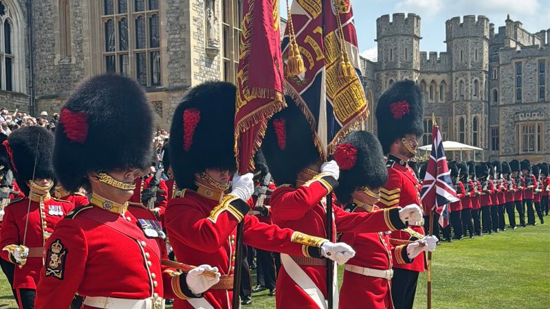 King Charles presents the Coldstream Guards with new colours at Windsor ...