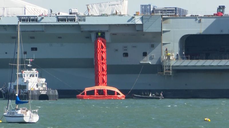 Inflatable slides and life rafts deployed in HMS Queen Elizabeth ...