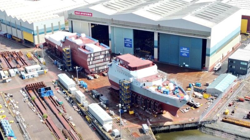 Drone footage shows rear half of HMS Cardiff rolled out of build hall