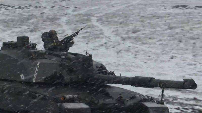 Watch: Royal Tank Regiment's snow patrol plough through blizzards in ...