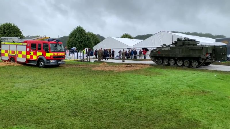 Watch: British Army Warrior rescues fire engine stuck in the mud