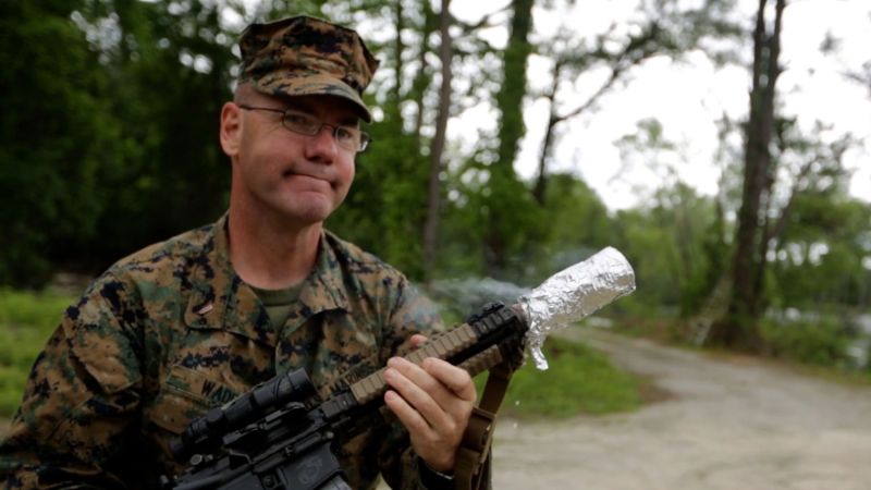 Watch as US Marine gunner cooks crispy bacon... on a rifle